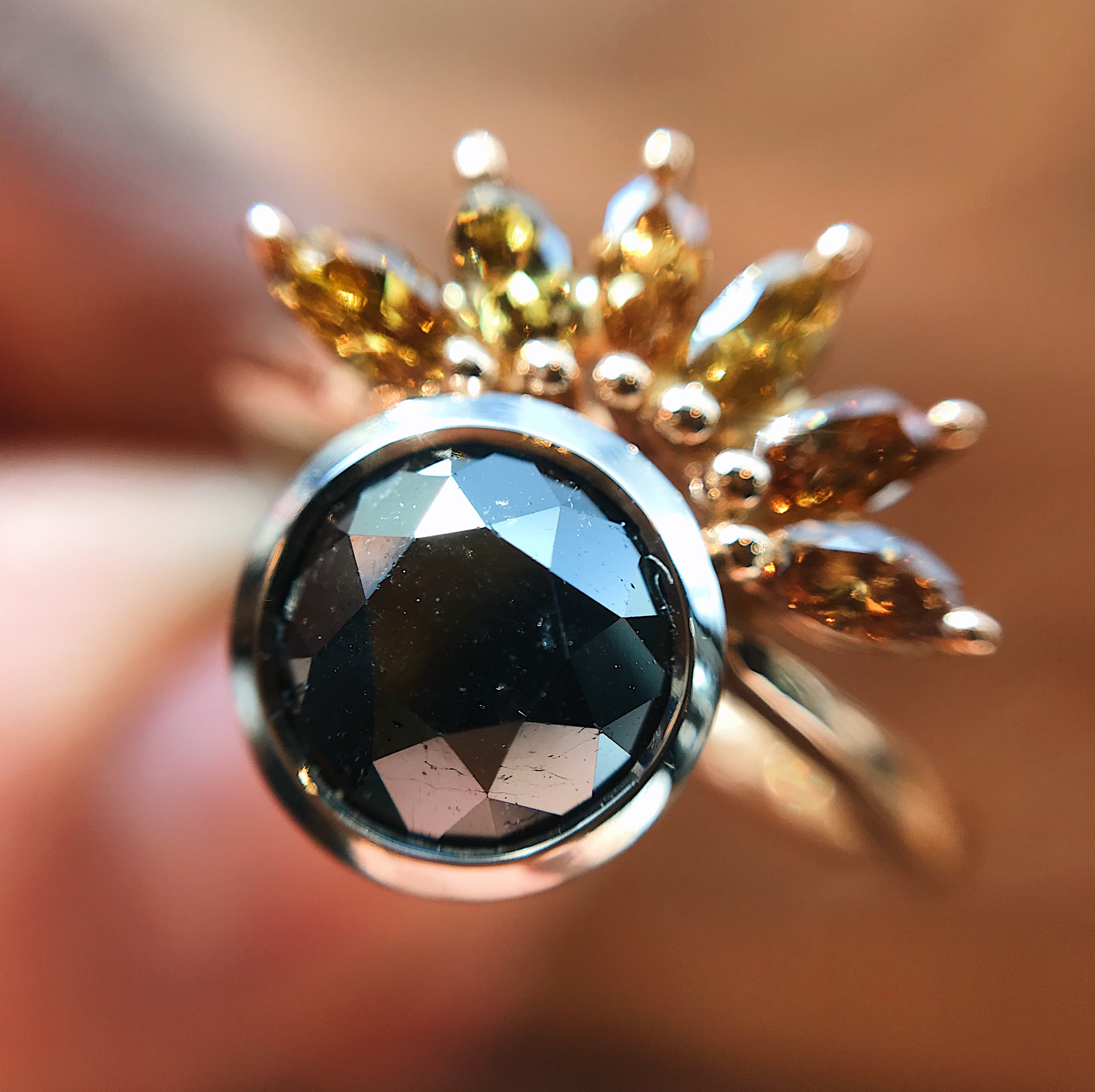 Limited edition 18ct rose gold, black and orange diamond Sun-ray ring ...