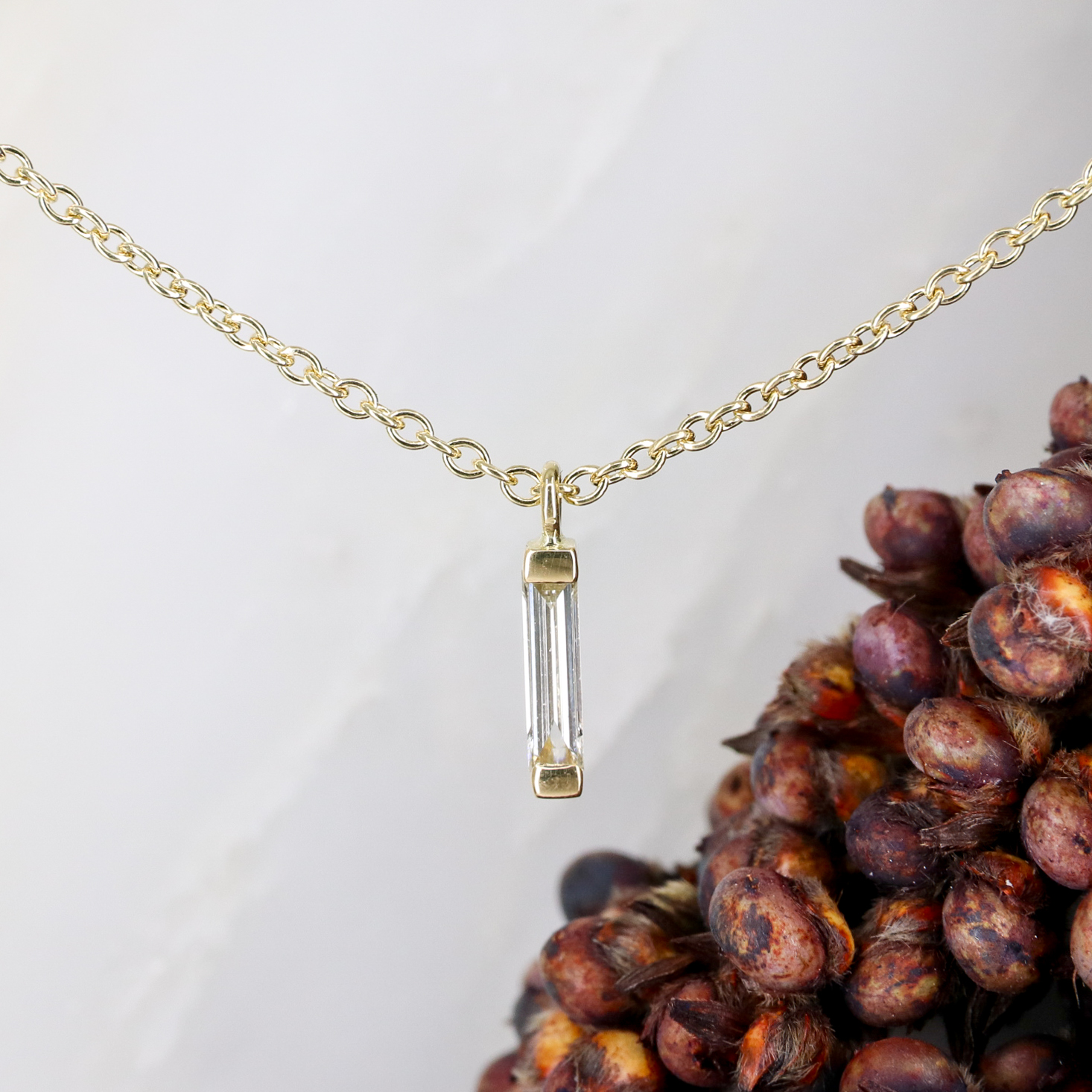 9ct yellow gold small baguette white diamond pendant - Baroque Jewellery