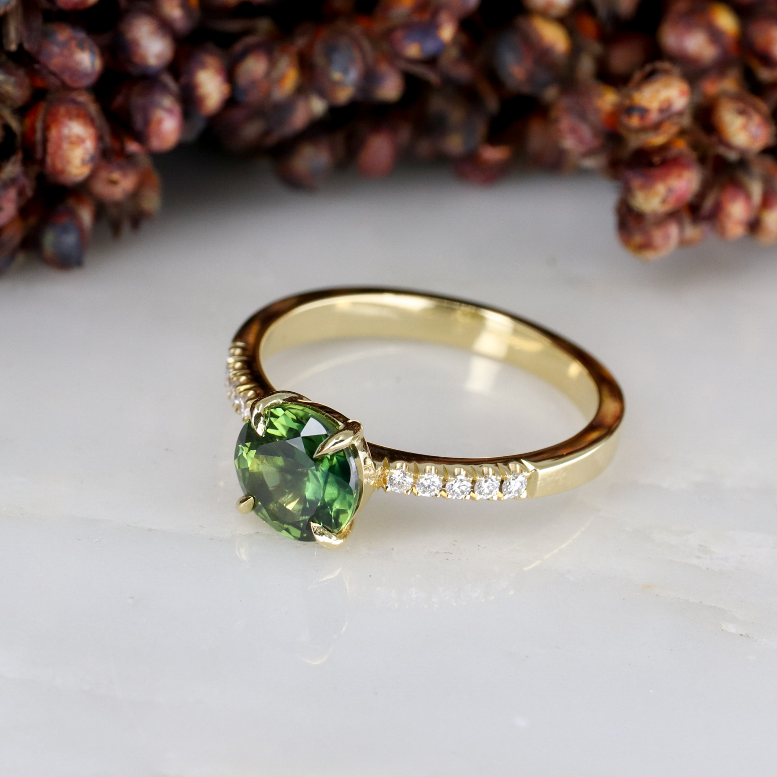 18ct Fairtrade yellow gold round green sapphire rise ring - Baroque ...