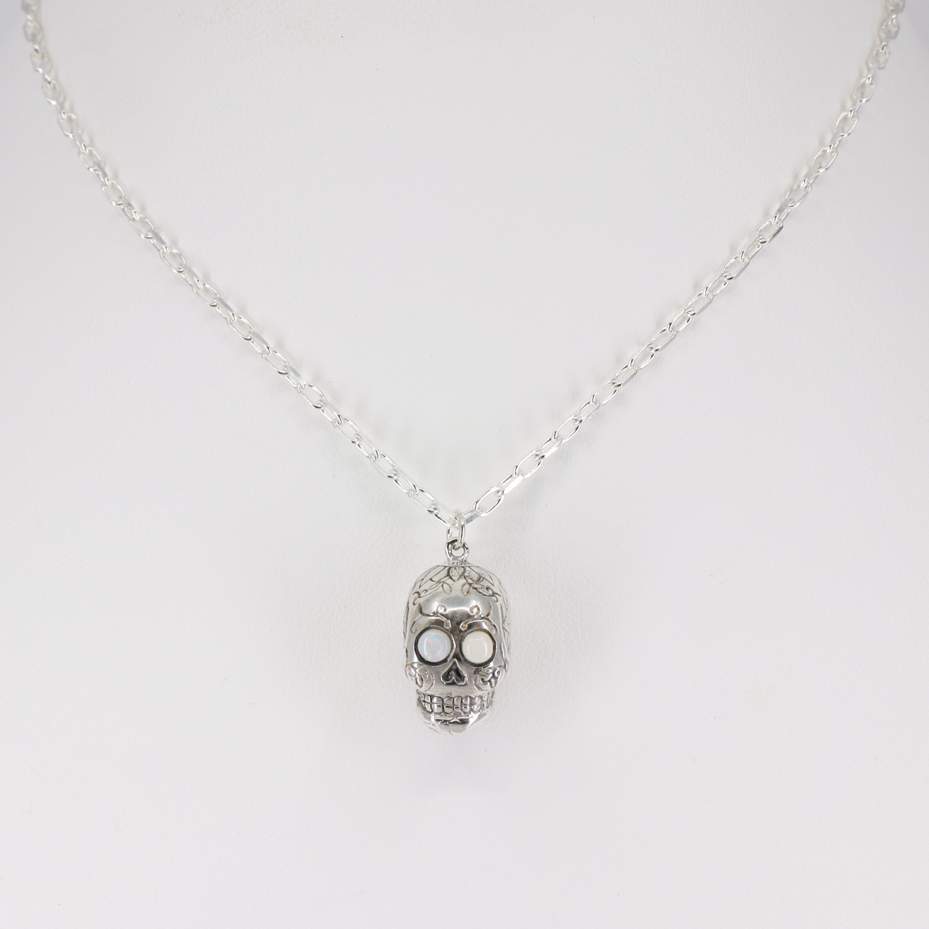 Silver sugar skull pendant set with opal eyes - Baroque Jewellery