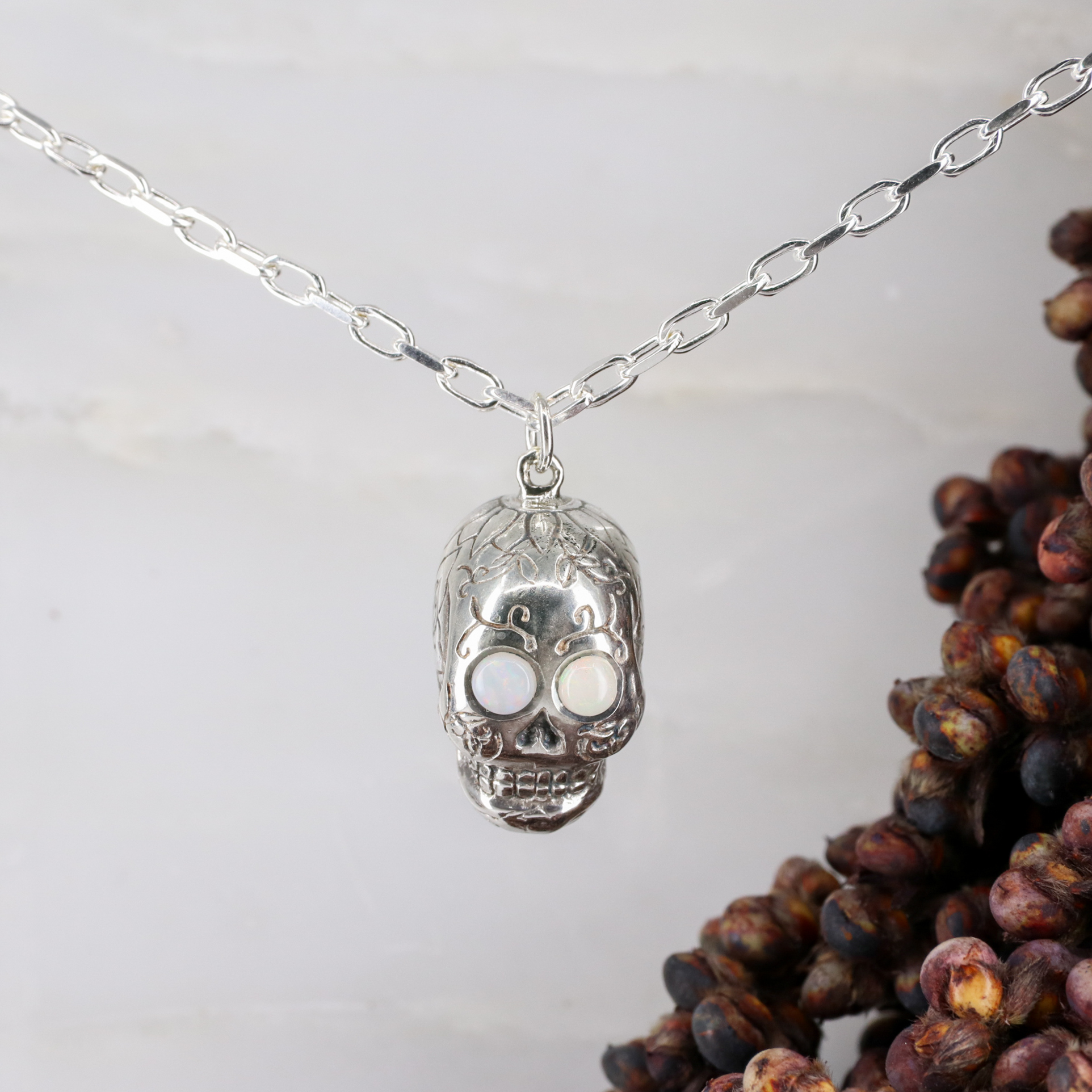 Silver sugar skull pendant set with opal eyes - Baroque Jewellery