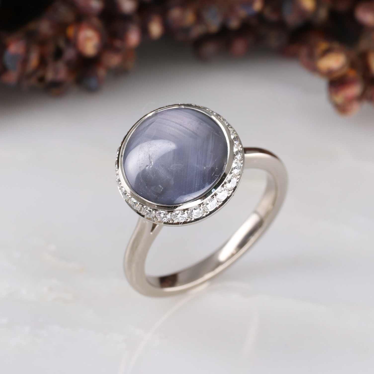 18ct white gold star sapphire ring with white diamond halo - Baroque ...