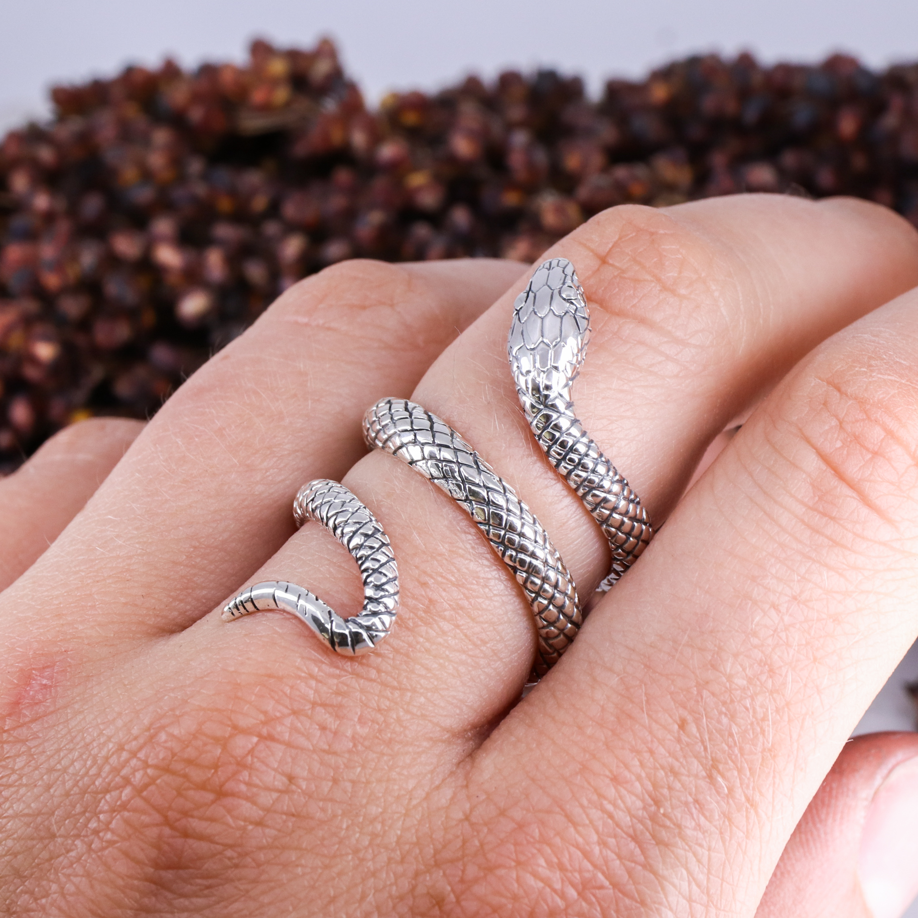 Silver coiled snake ring with white diamond eyes - Baroque Jewellery