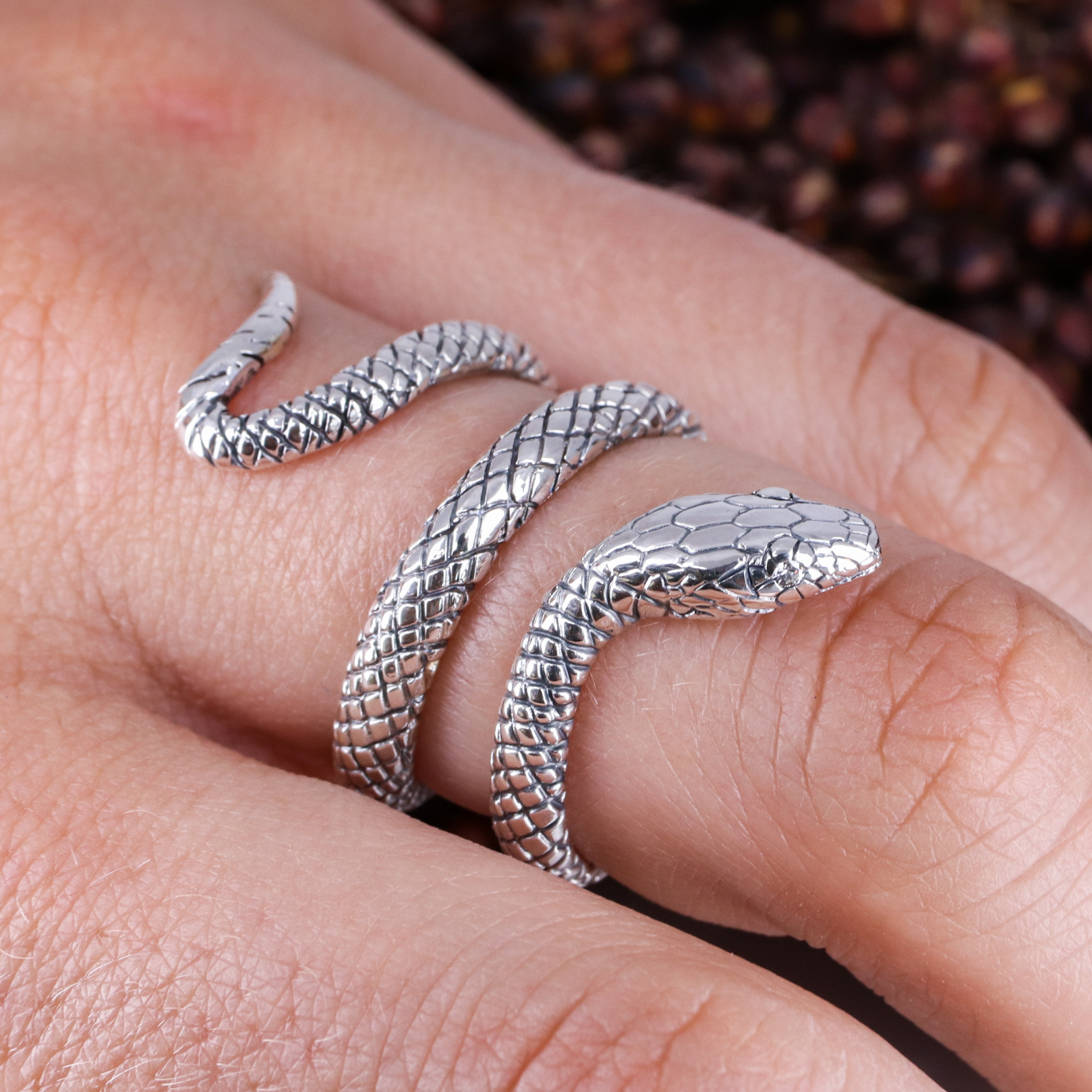 Silver coiled snake ring with white diamond eyes - Baroque Jewellery