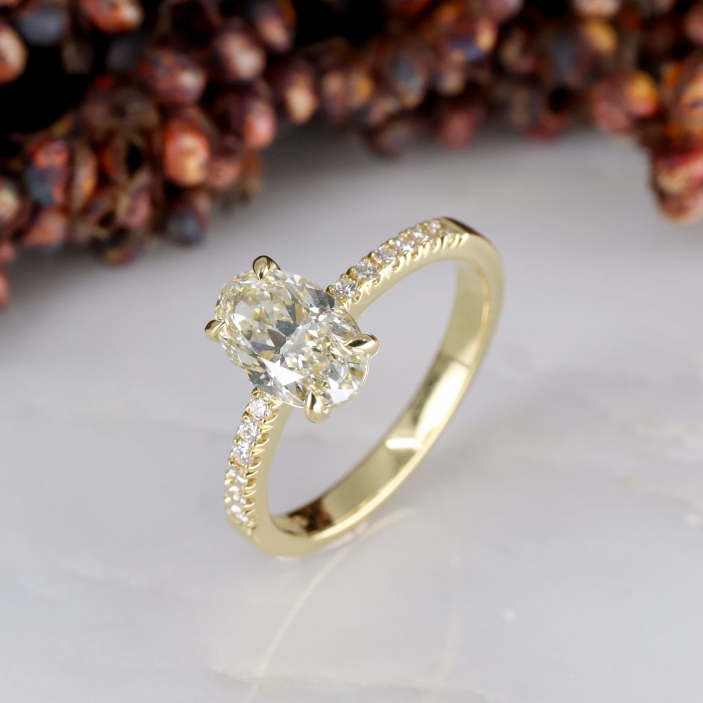 18ct yellow gold 1.30ct oval pale yellow diamond rise ring - Baroque ...