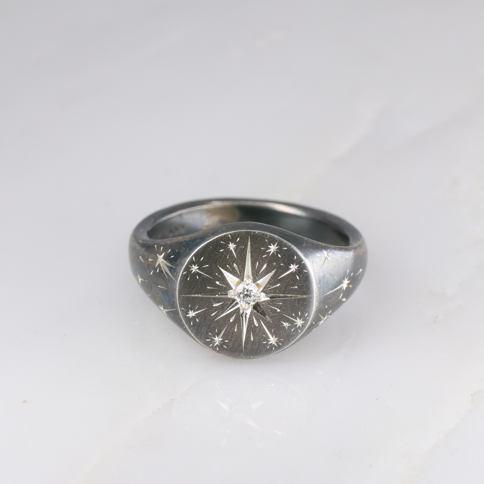 Silver signet ring with Star engraving and white diamond detail ...