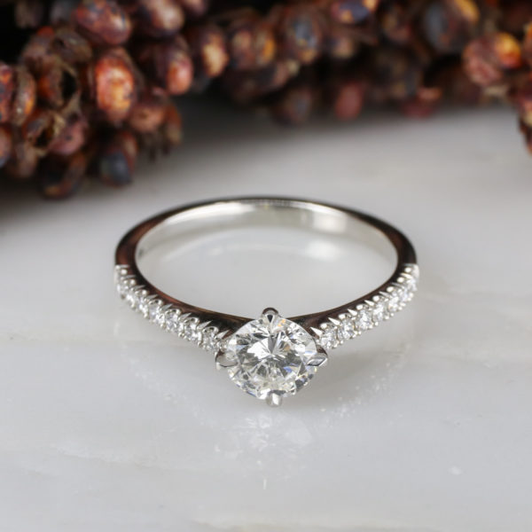 Platinum compass set solitaire ring with round brilliant cut white ...