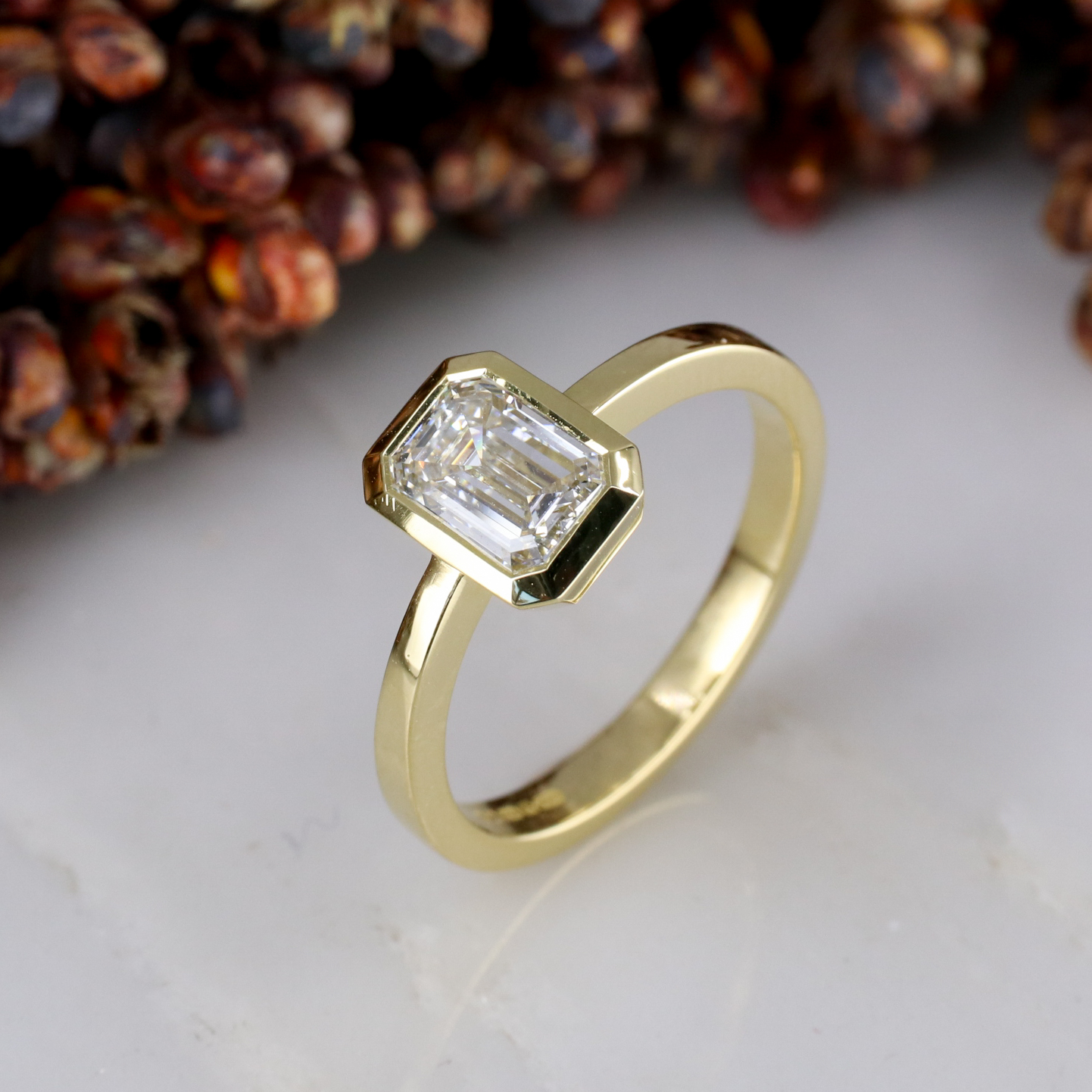 18ct yellow gold Emerald cut lab-grown diamond Rise engagement ring ...