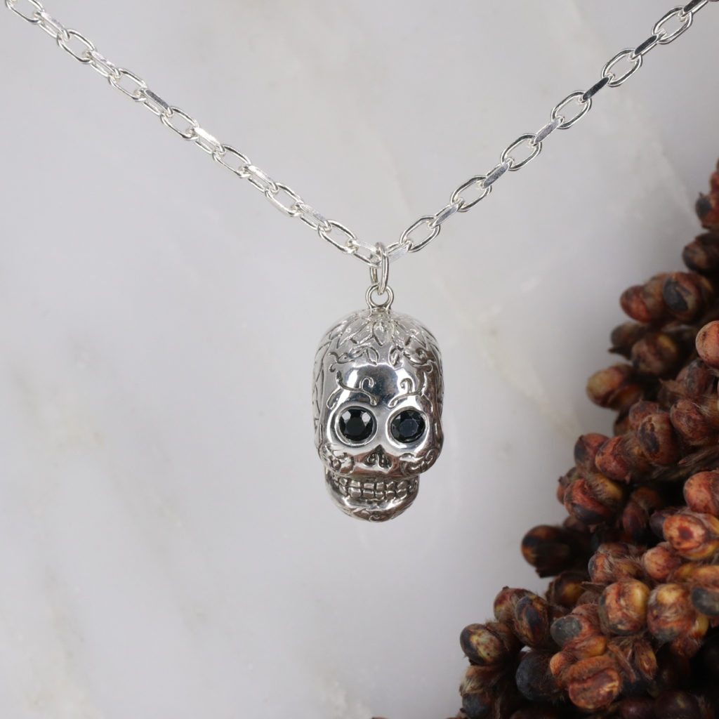Silver sugar skull pendant set with black diamond eyes - Baroque Jewellery